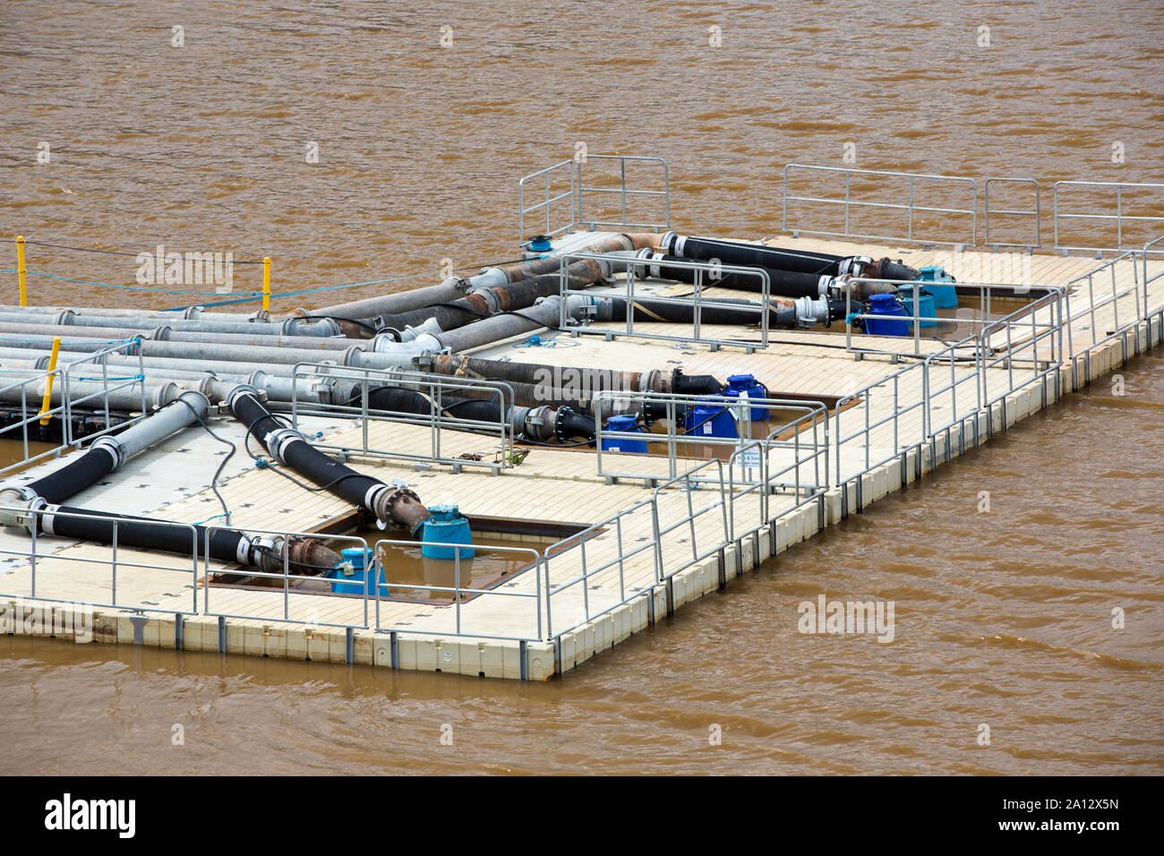 Pumping out water from Toddbrook Reservoir above Whaley Bridge in ...