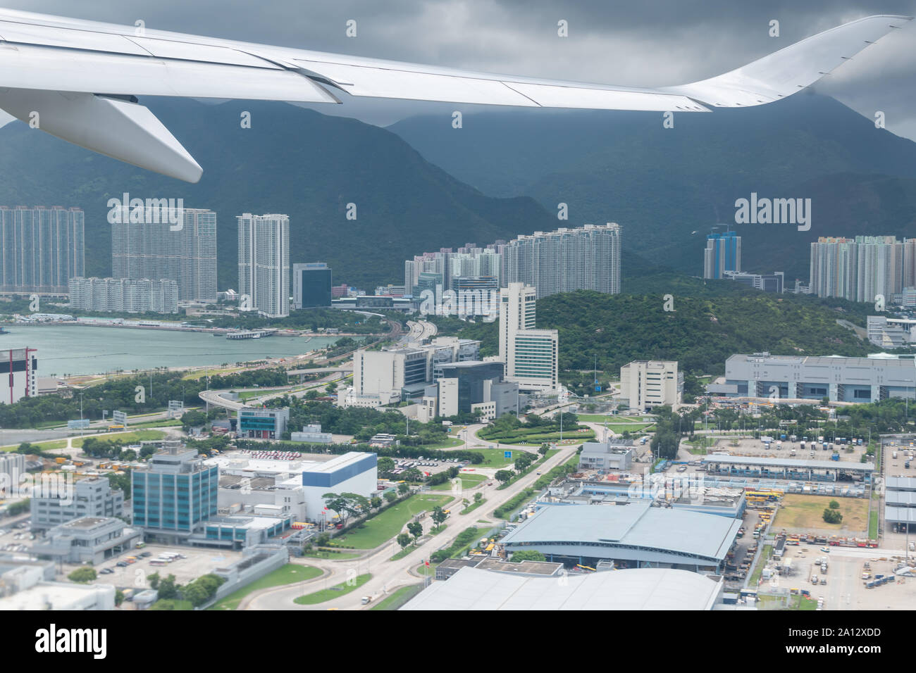 View out of a plane window while plane is taking off at Hong Kong ...