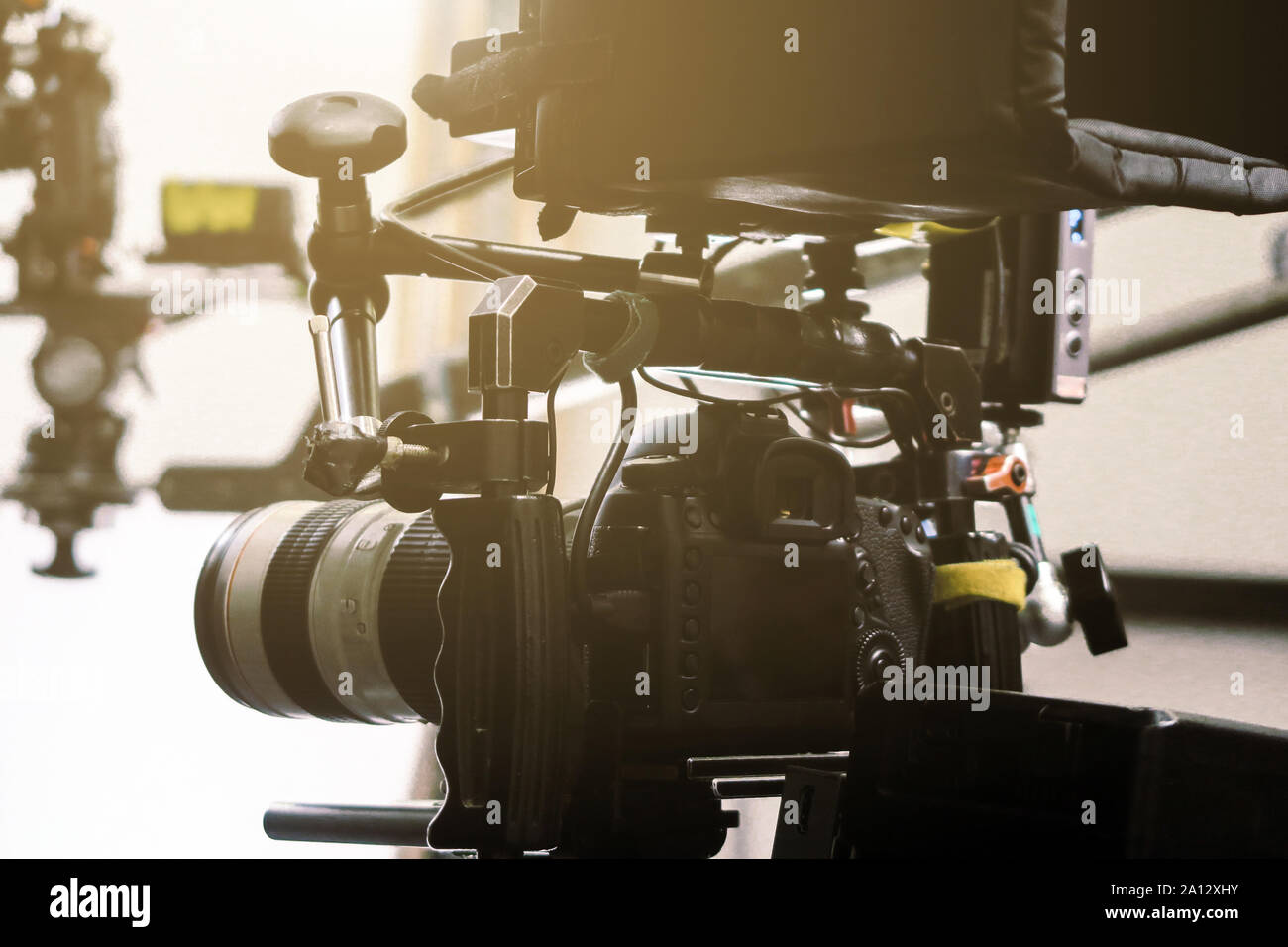 Film industry. Filming with professional camera background Stock Photo ...