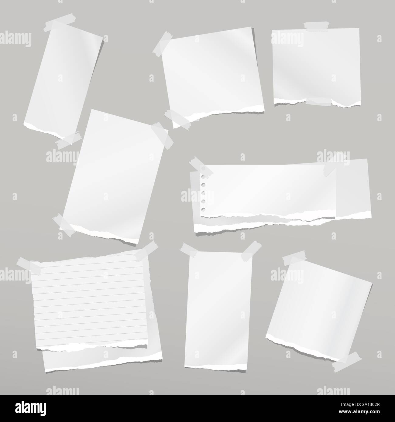 Torn white note, notebook paper strips stuck with sticky tape on grey ...