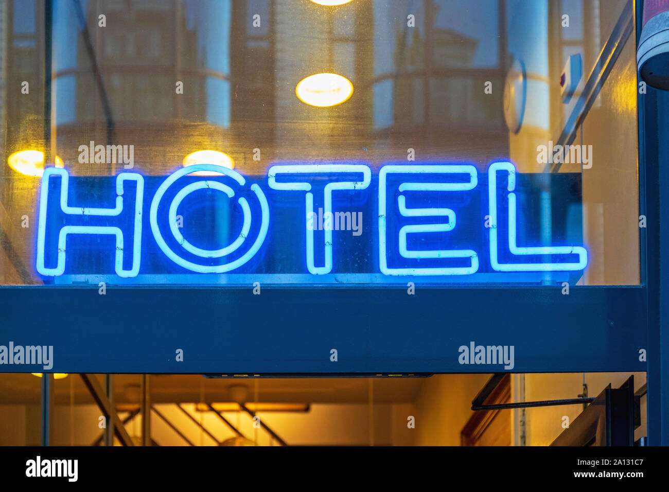 Big Hotel Sign Blue Electric Neon Lights Stock Photo - Alamy
