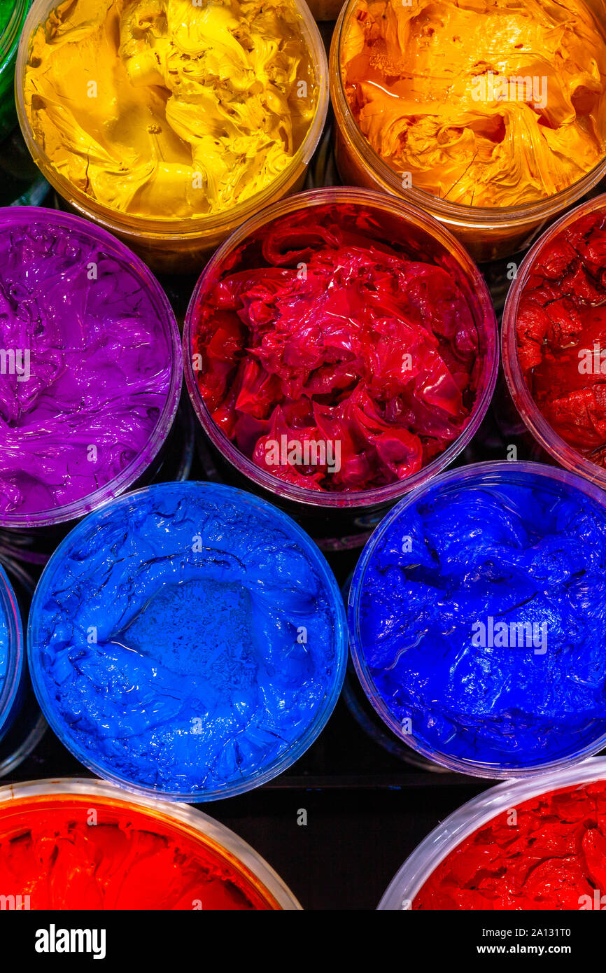 several colors plastisol ink cans in factory who use plastisol ink to ...