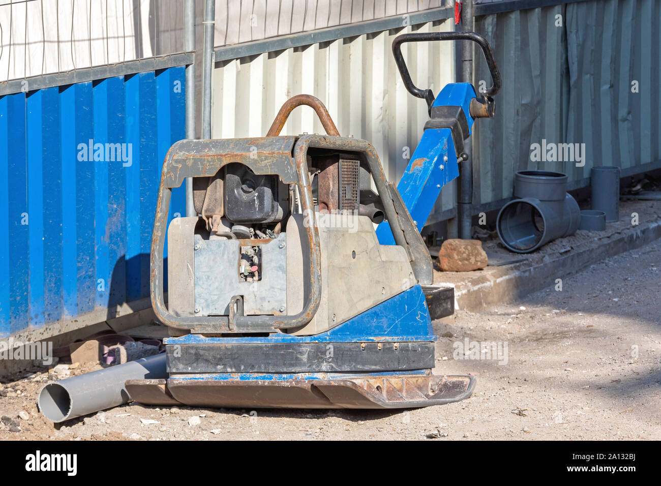 Vibratory Plate Compactor Machine at Street Construction Site Stock ...