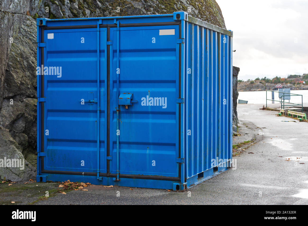 One Blue Cargo Container at Coast in Sweden Stock Photo - Alamy