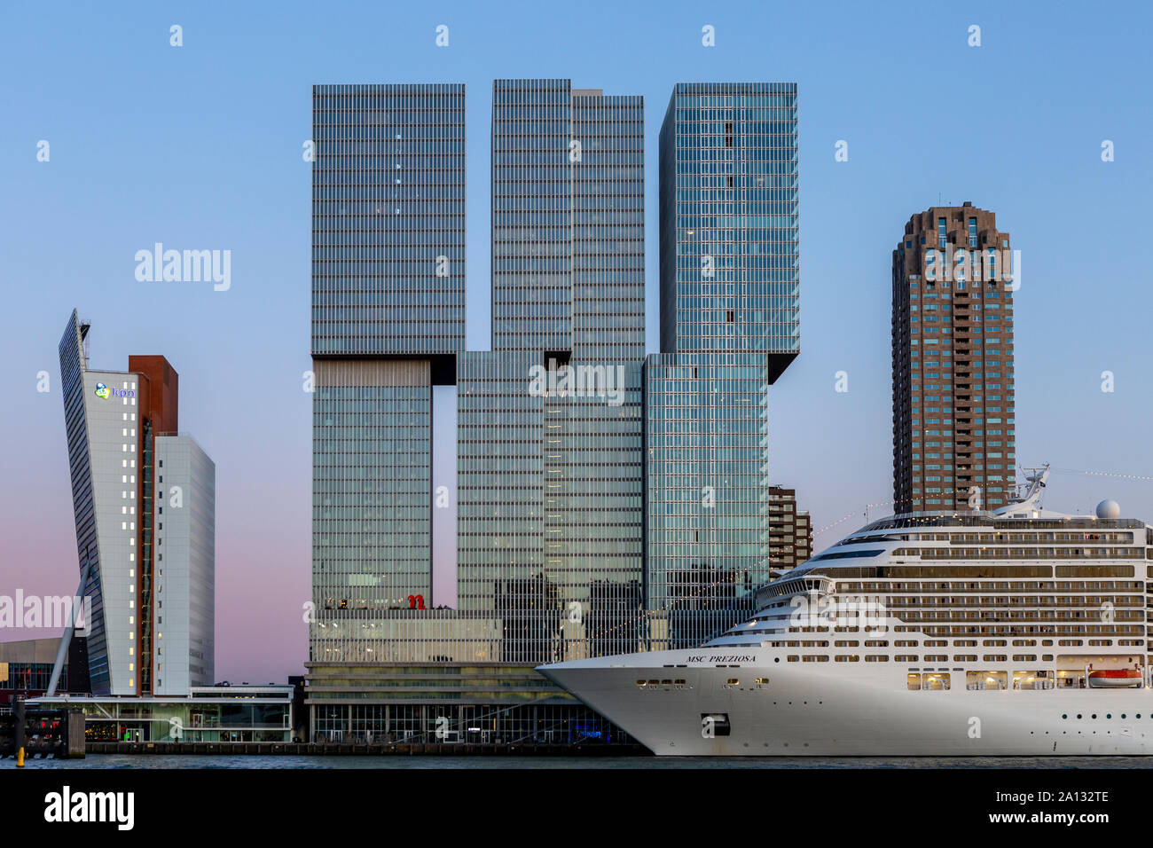 Cruise ship MSC Preziosa in front of the iconic Dutch port city skyline ...