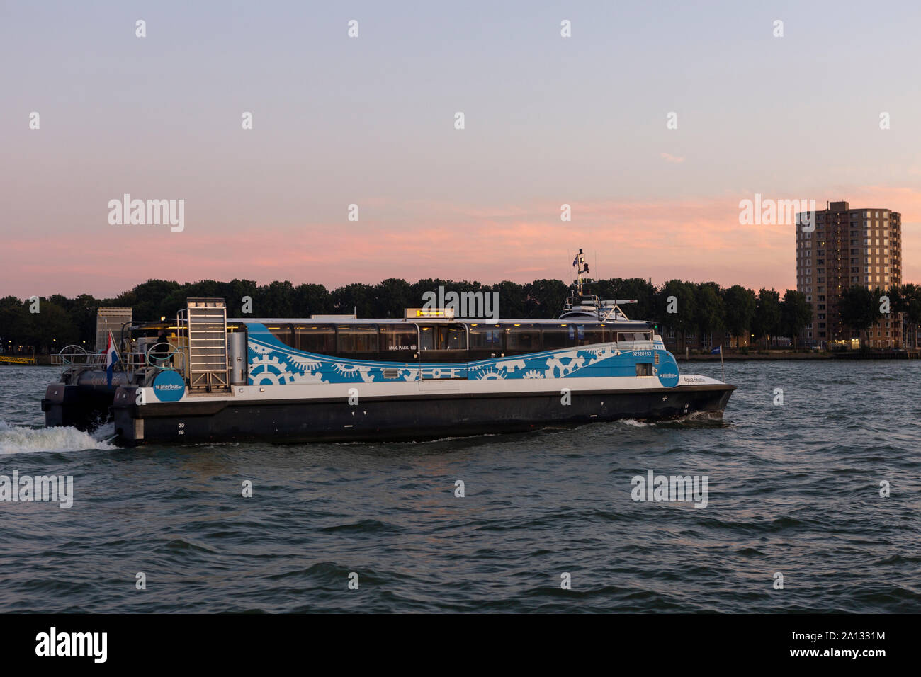 Waterbus aqua shuttle passing by in the city centre and port area of ...