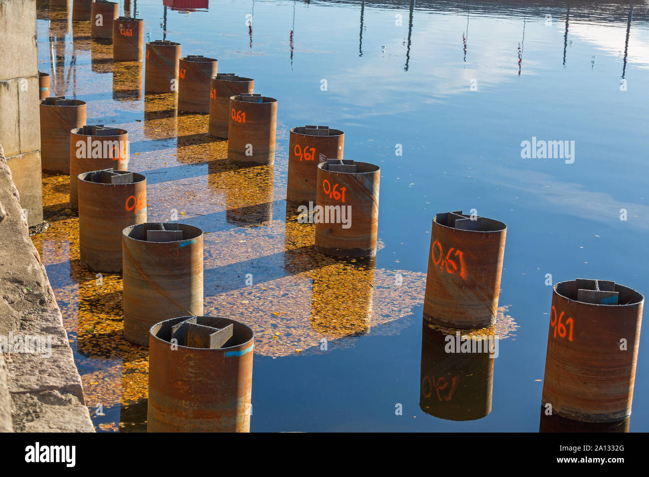Steel Pipes With Beam Support in Water Construction Stock Photo - Alamy