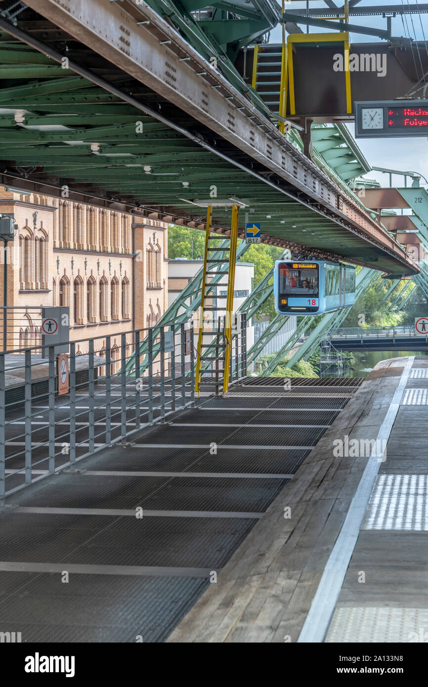 The amazing hanging monorail called the Schwebebahn in Wuppertal, near ...