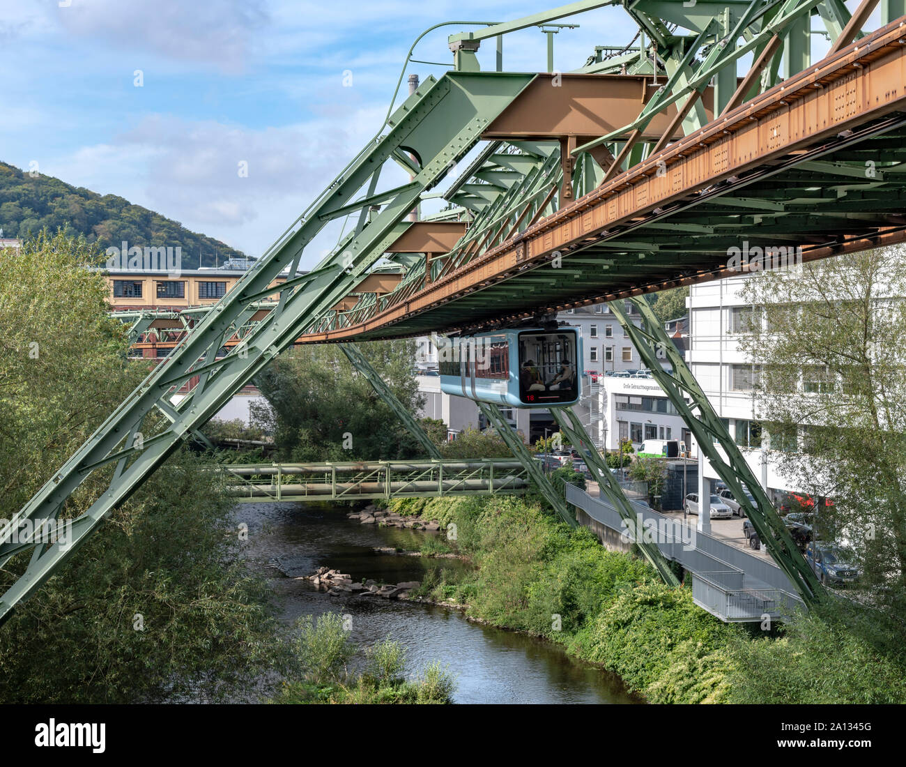 The amazing hanging monorail called the Schwebebahn in Wuppertal, near ...