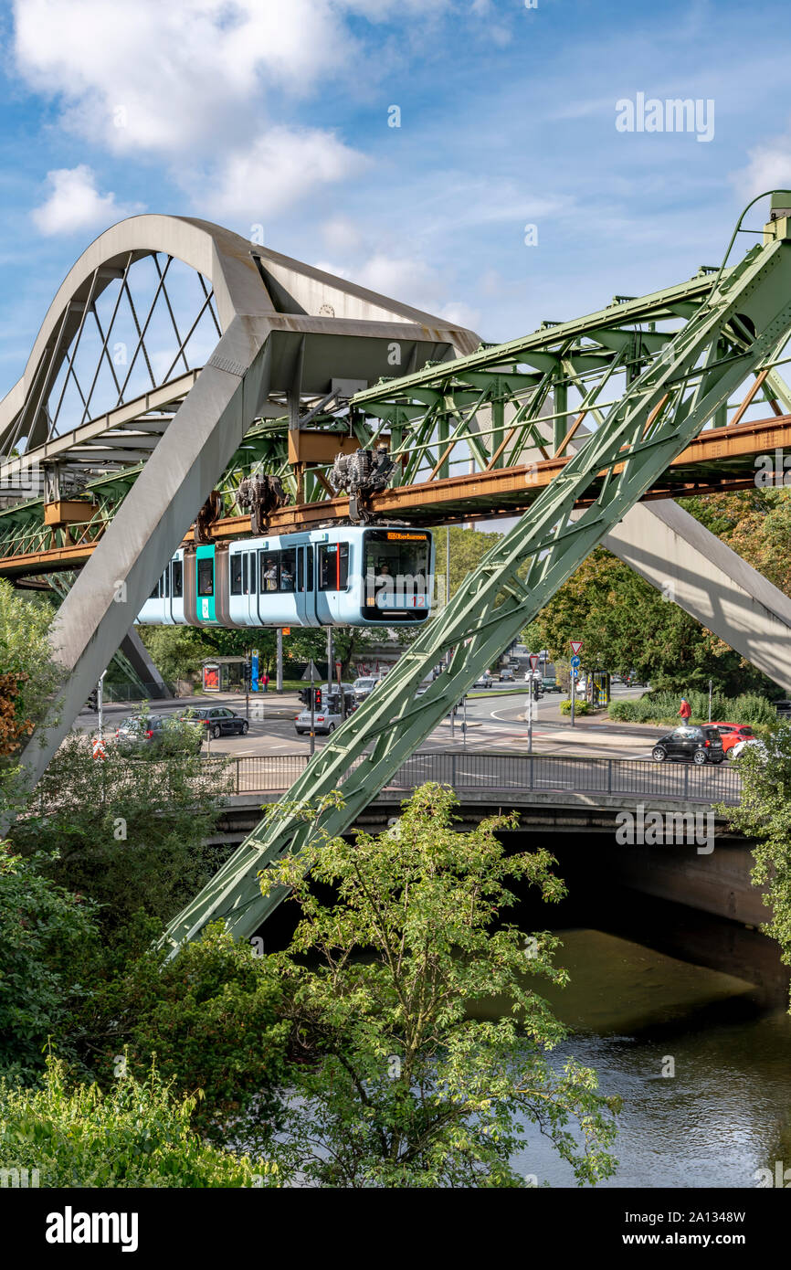 The amazing hanging monorail called the Schwebebahn in Wuppertal, near ...
