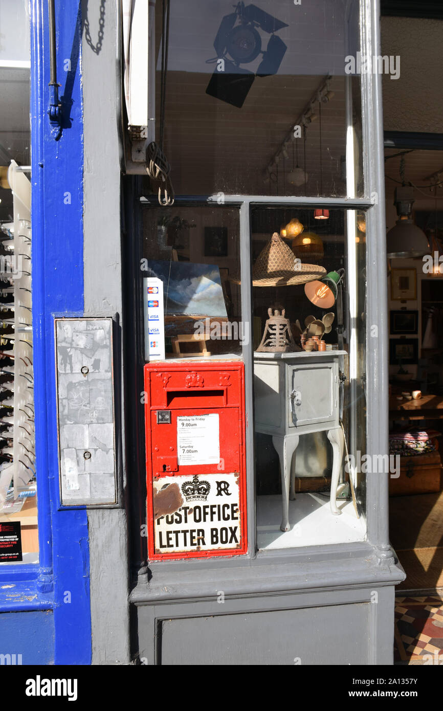 Working Victorian letter box in the window of an antiques shop ...