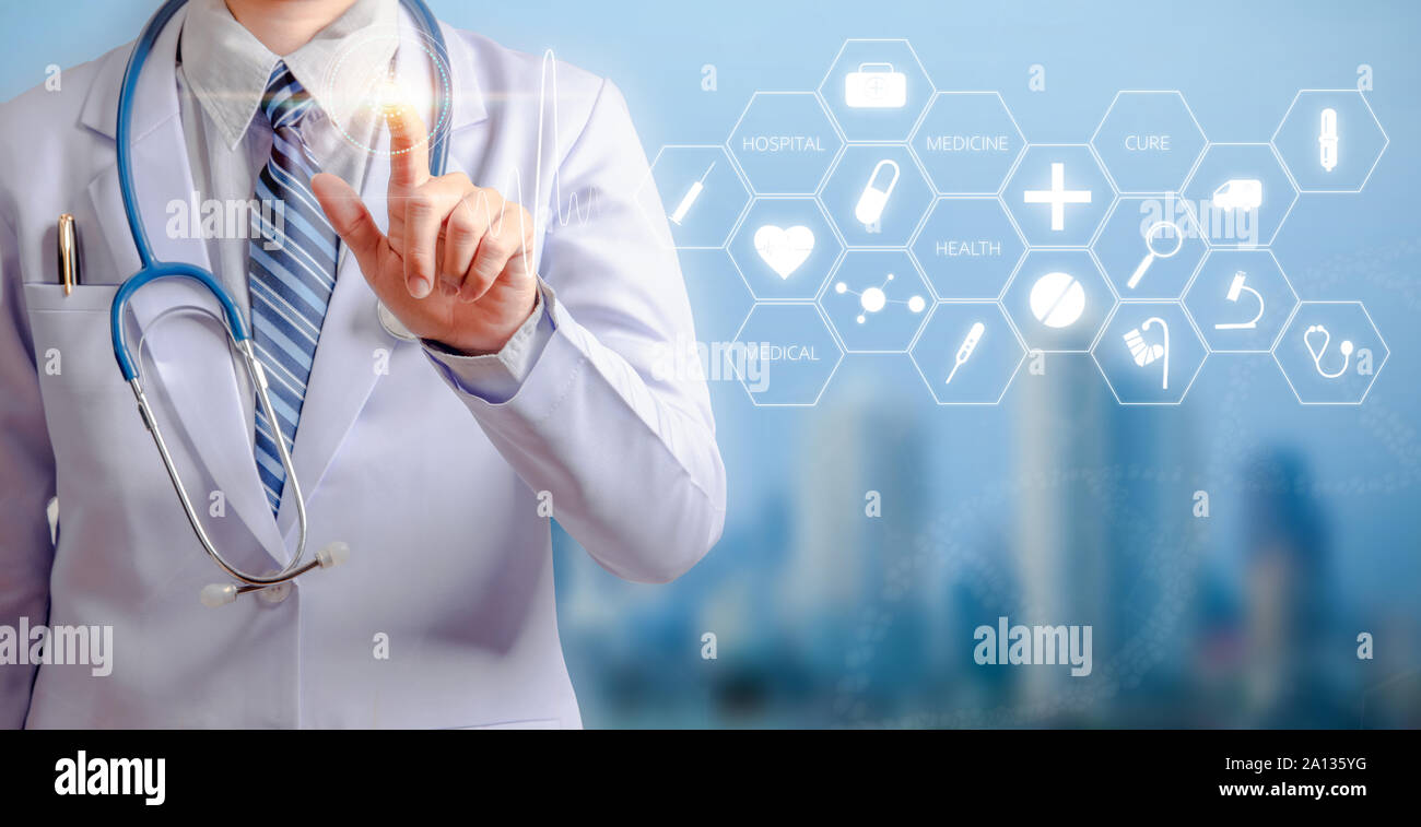 woman doctor holding index finger and touching visual screen ...