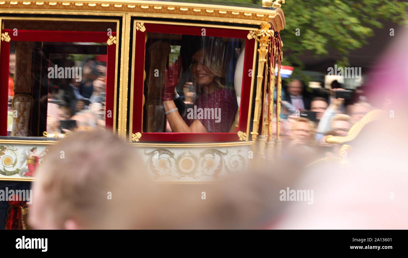 Queen Maxima of the Dutch royal family waving and smiling to the crowd ...