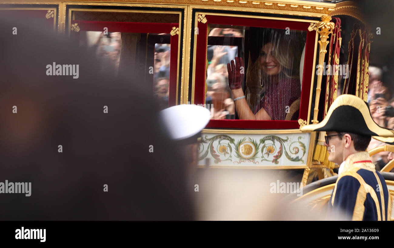 Queen Maxima of the Dutch royal family waving and smiling to the crowd ...