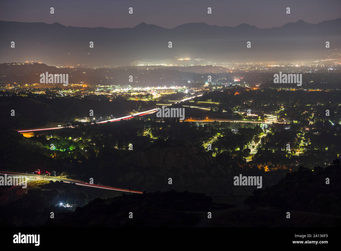 Night hilltop view of the north San Fernando Valley and 118 freeway in ...
