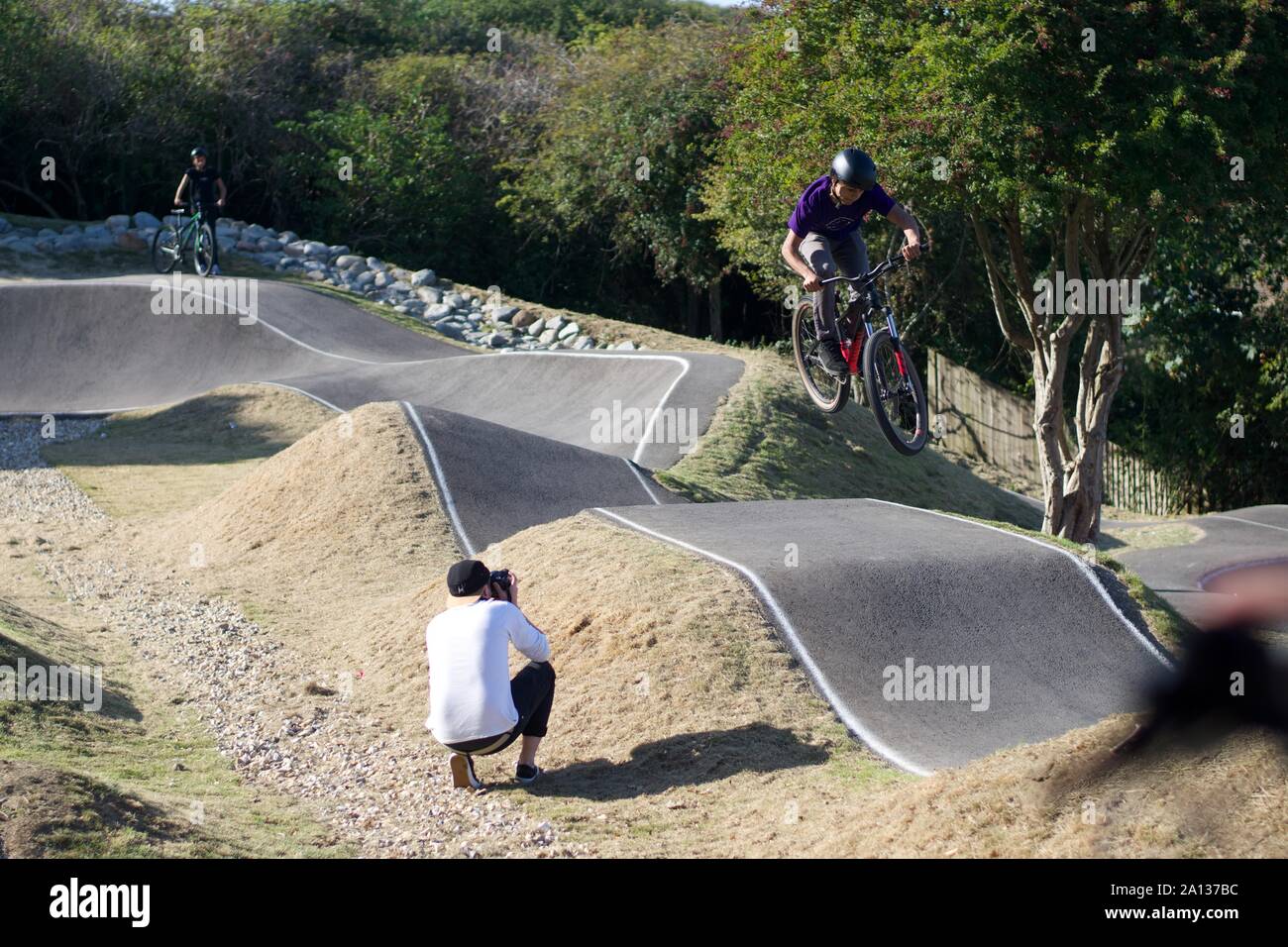Kids riding pump track hi-res stock photography and images - Alamy