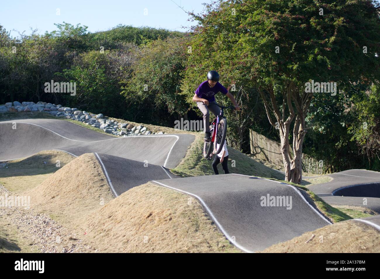 Kids riding pump track hi-res stock photography and images - Alamy