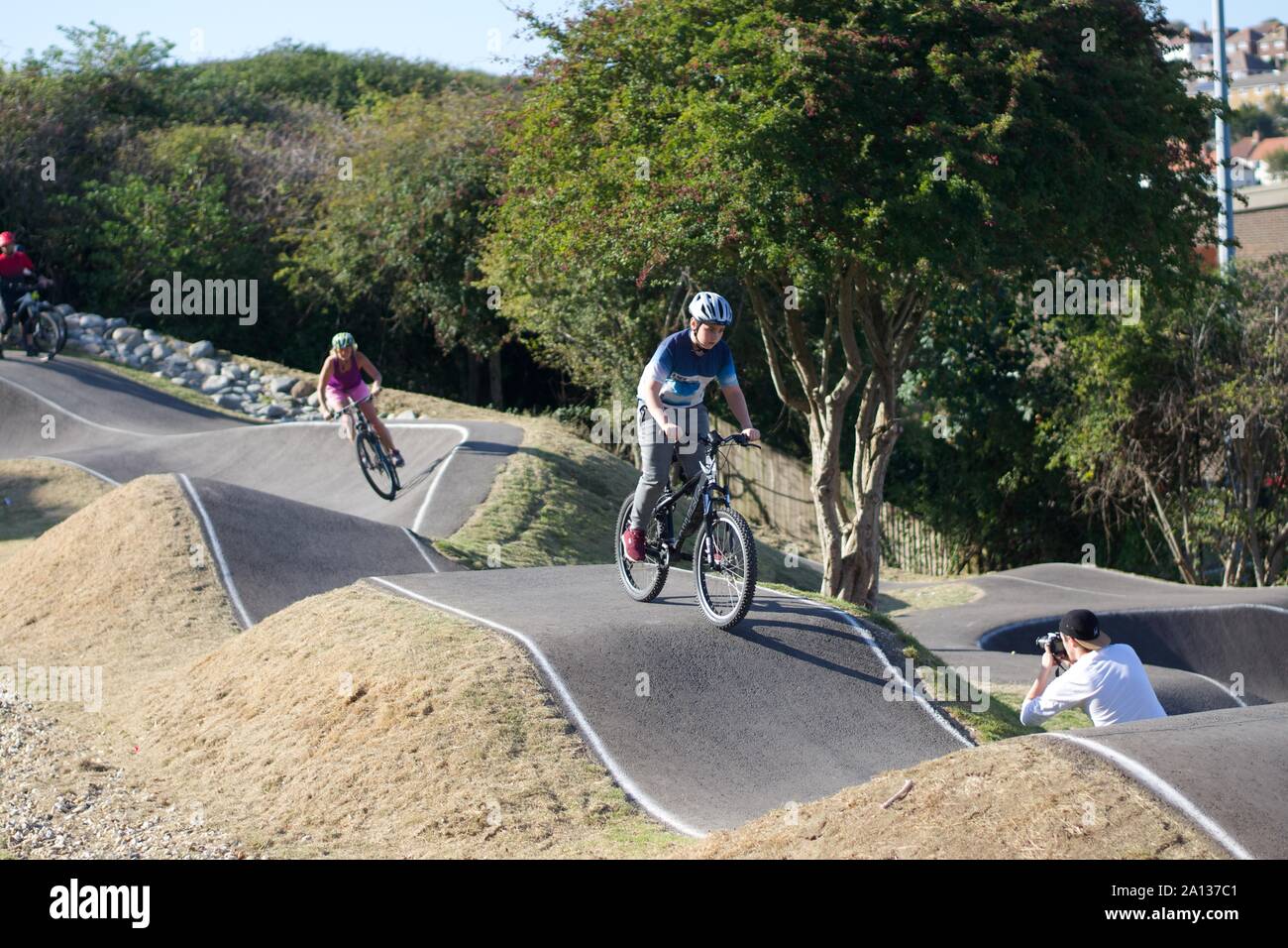 Kids riding pump track hi-res stock photography and images - Alamy