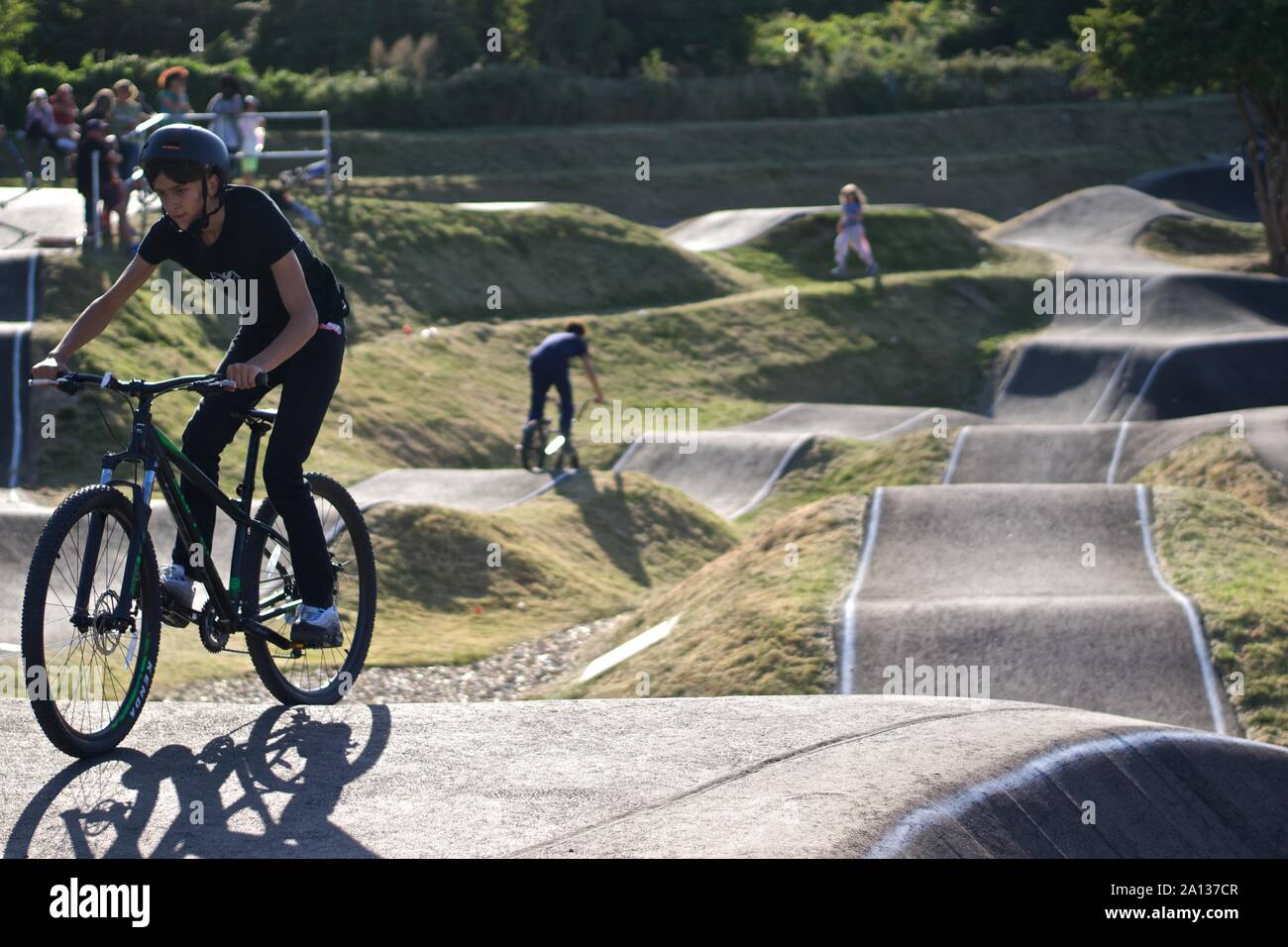 Kids riding pump track hi-res stock photography and images - Alamy