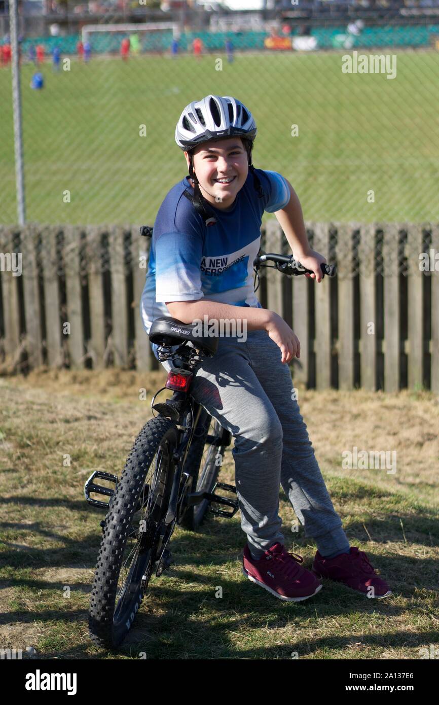Kids riding on pump bike track Stock Photo - Alamy