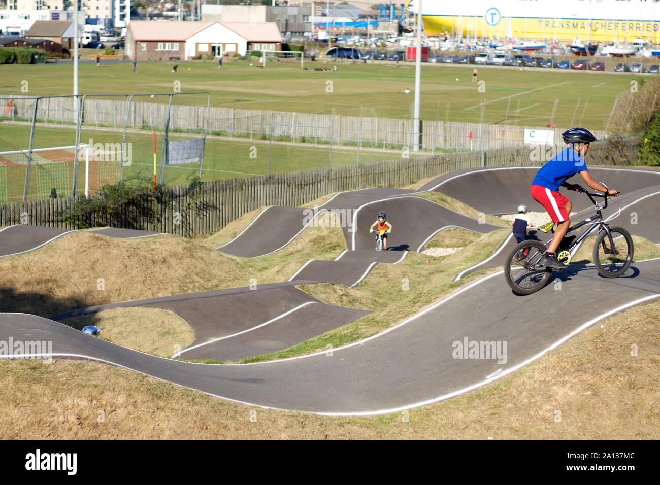 Kids riding pump track hi-res stock photography and images - Alamy