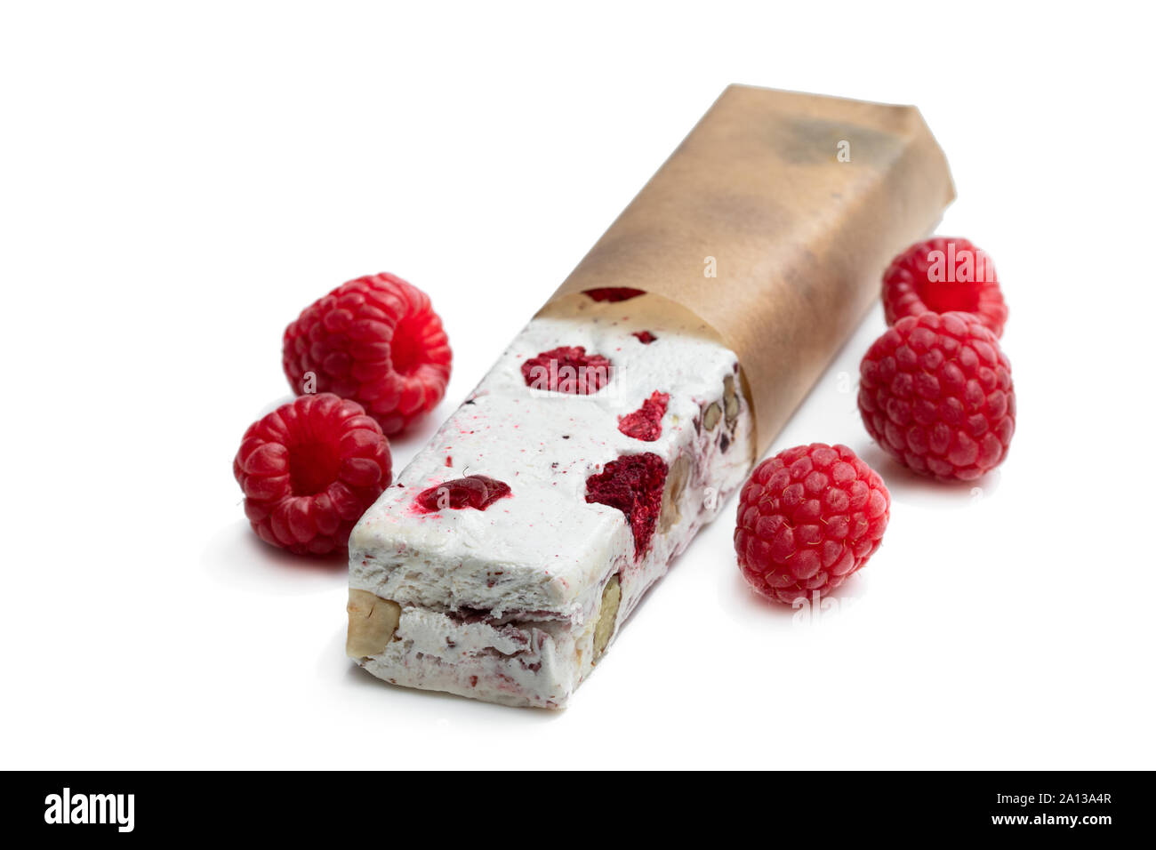 Homemade nougat bar with dried fruits isolated on white Stock Photo - Alamy