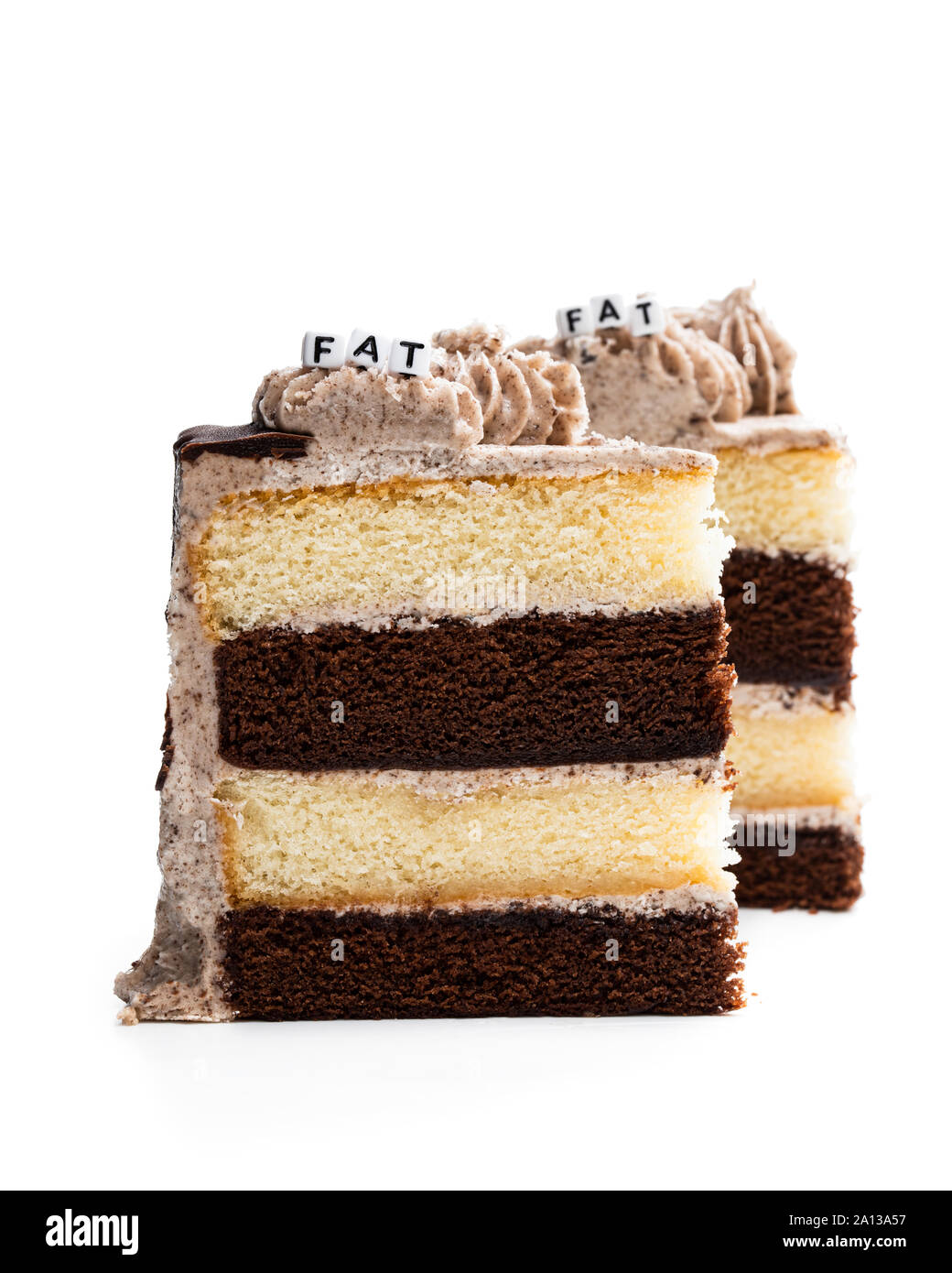 Concept of unhealthy fat food. Pieces of layered sponge cake isolated ...