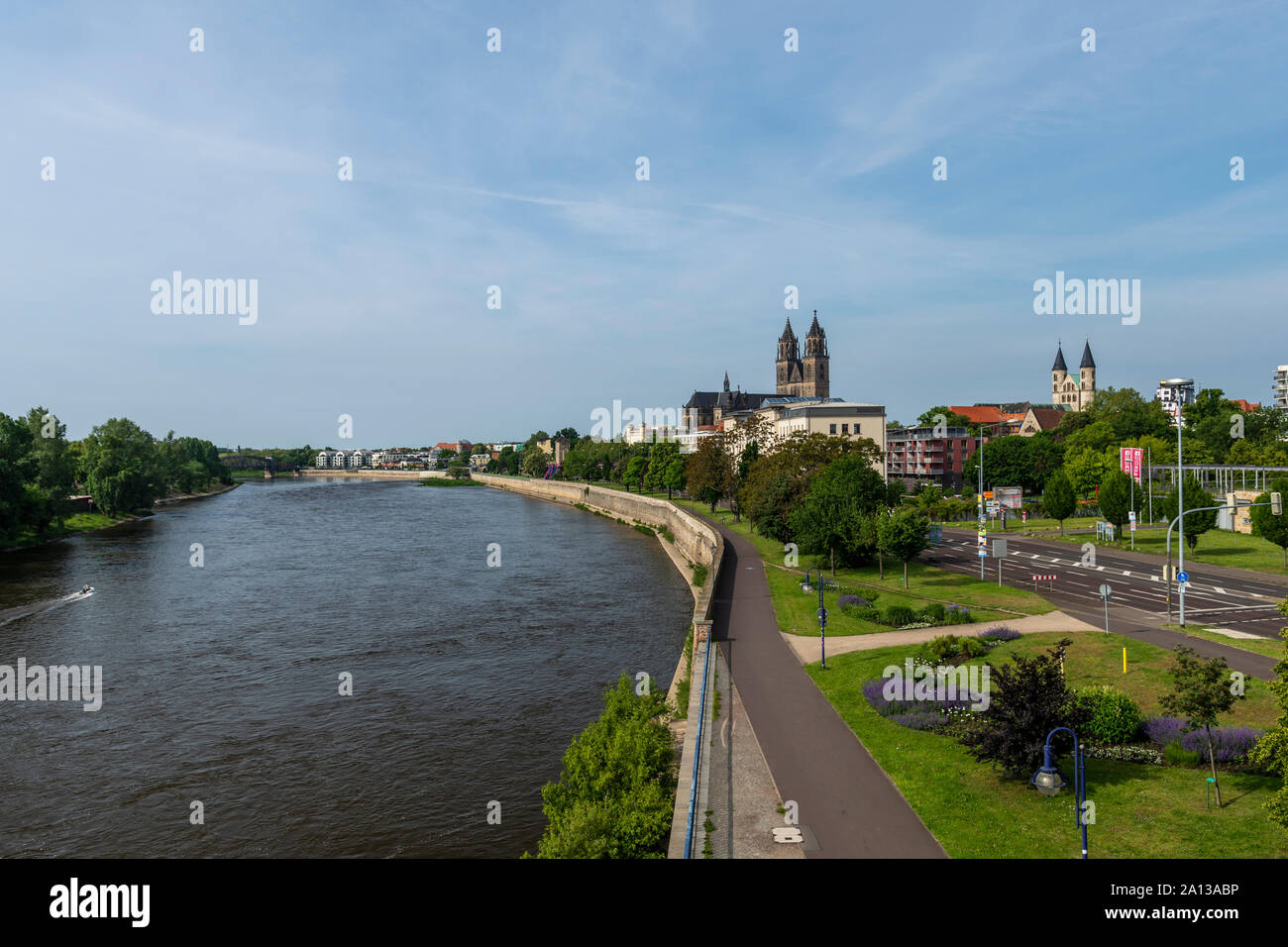 View over elbe and the old Magdeburg Cathedral with a blue sky in ...