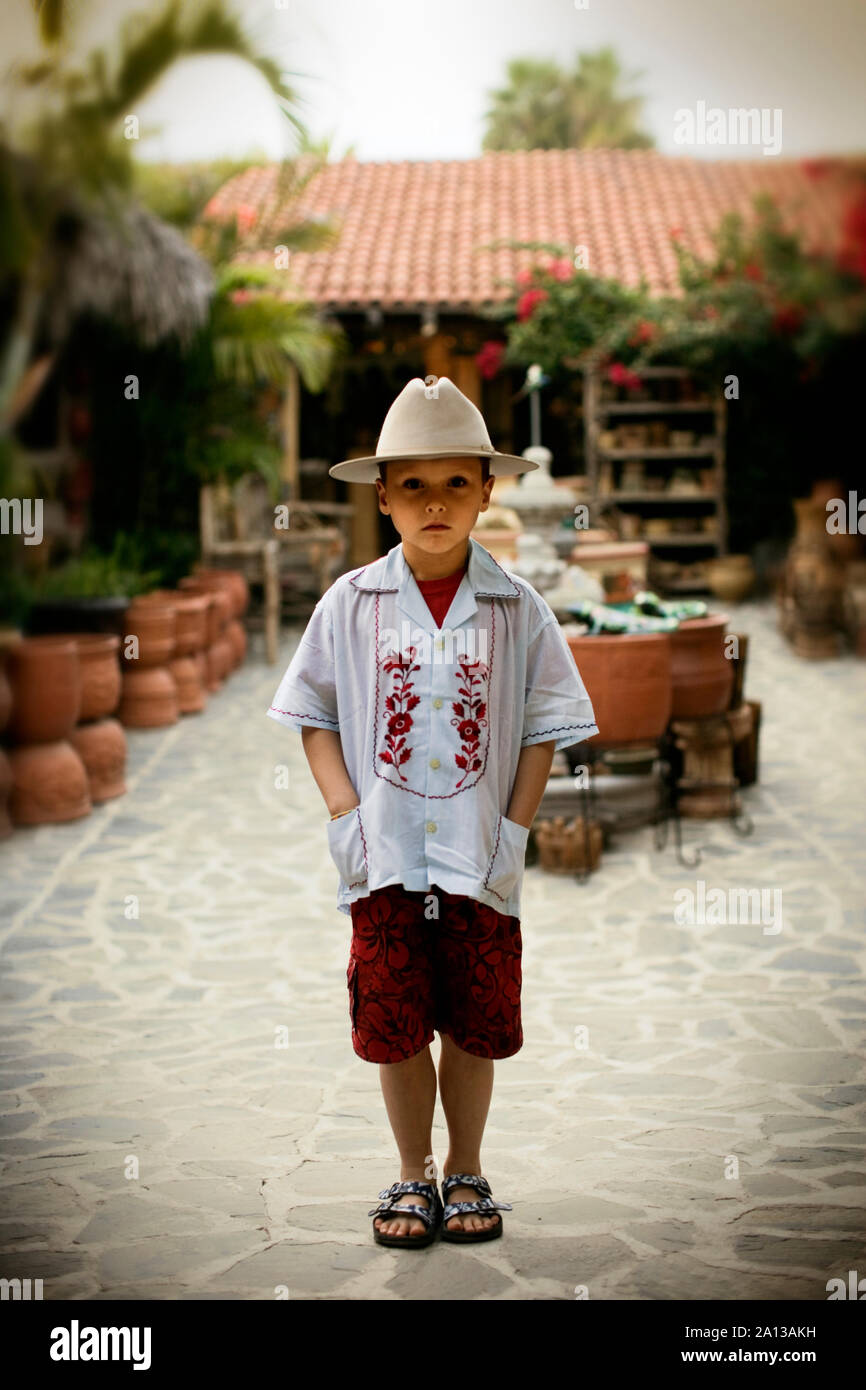 Portrait of an adorable boy wearing a hat Stock Photo - Alamy