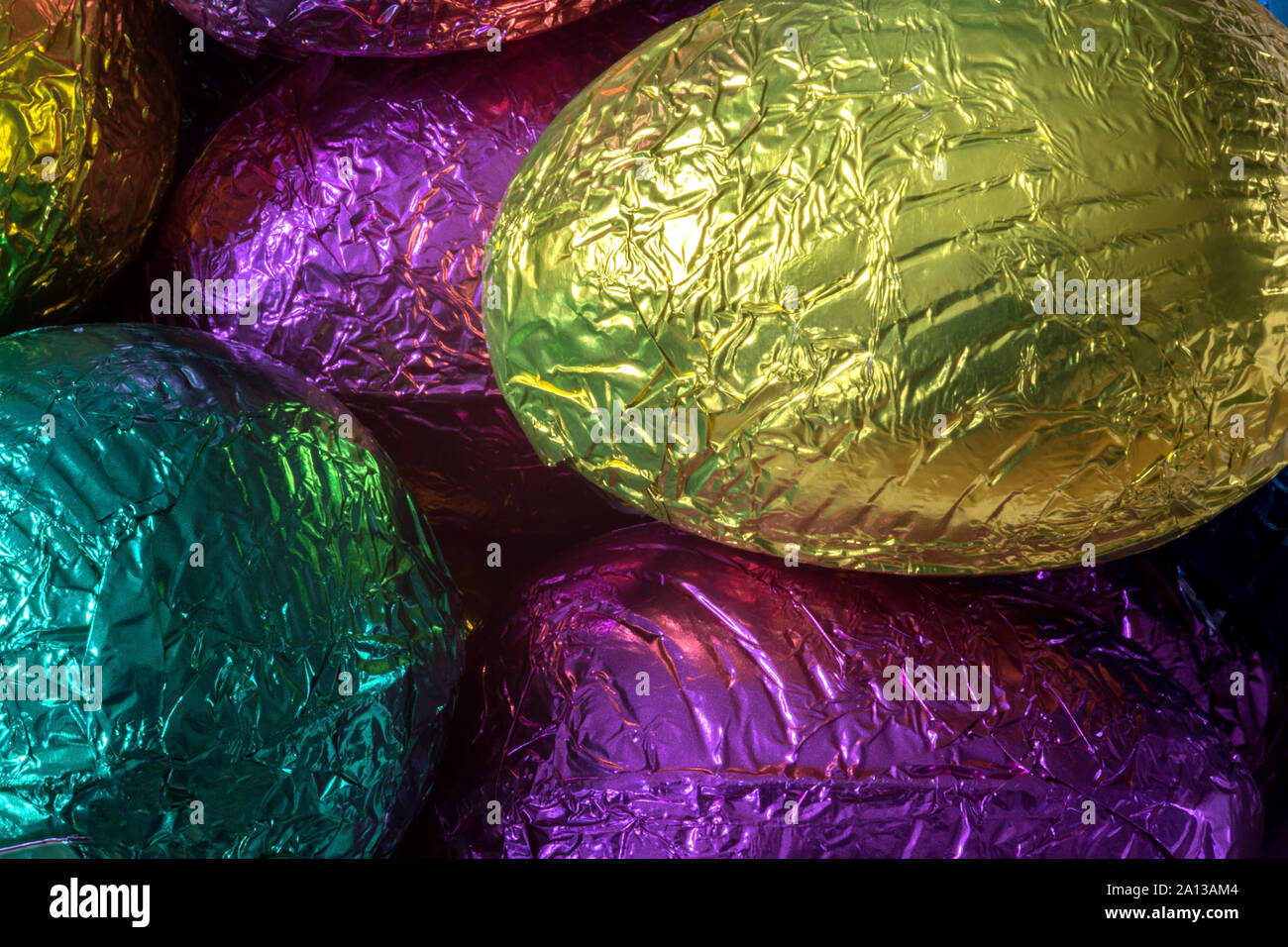 Pile of foil wrapped chocolate Easter eggs Stock Photo - Alamy
