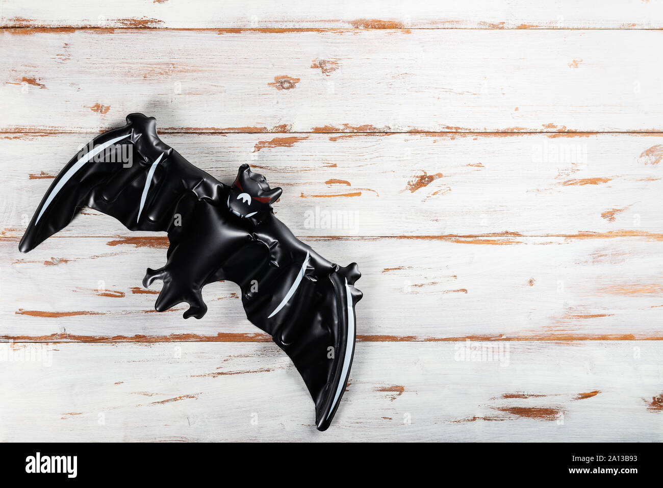 Inflatable black bat as Halloween party decoration concept, top view ...