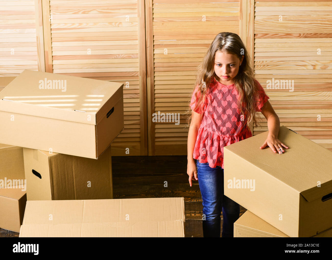 Kid girl relocating boxes background. Relocating concept. Delivery ...