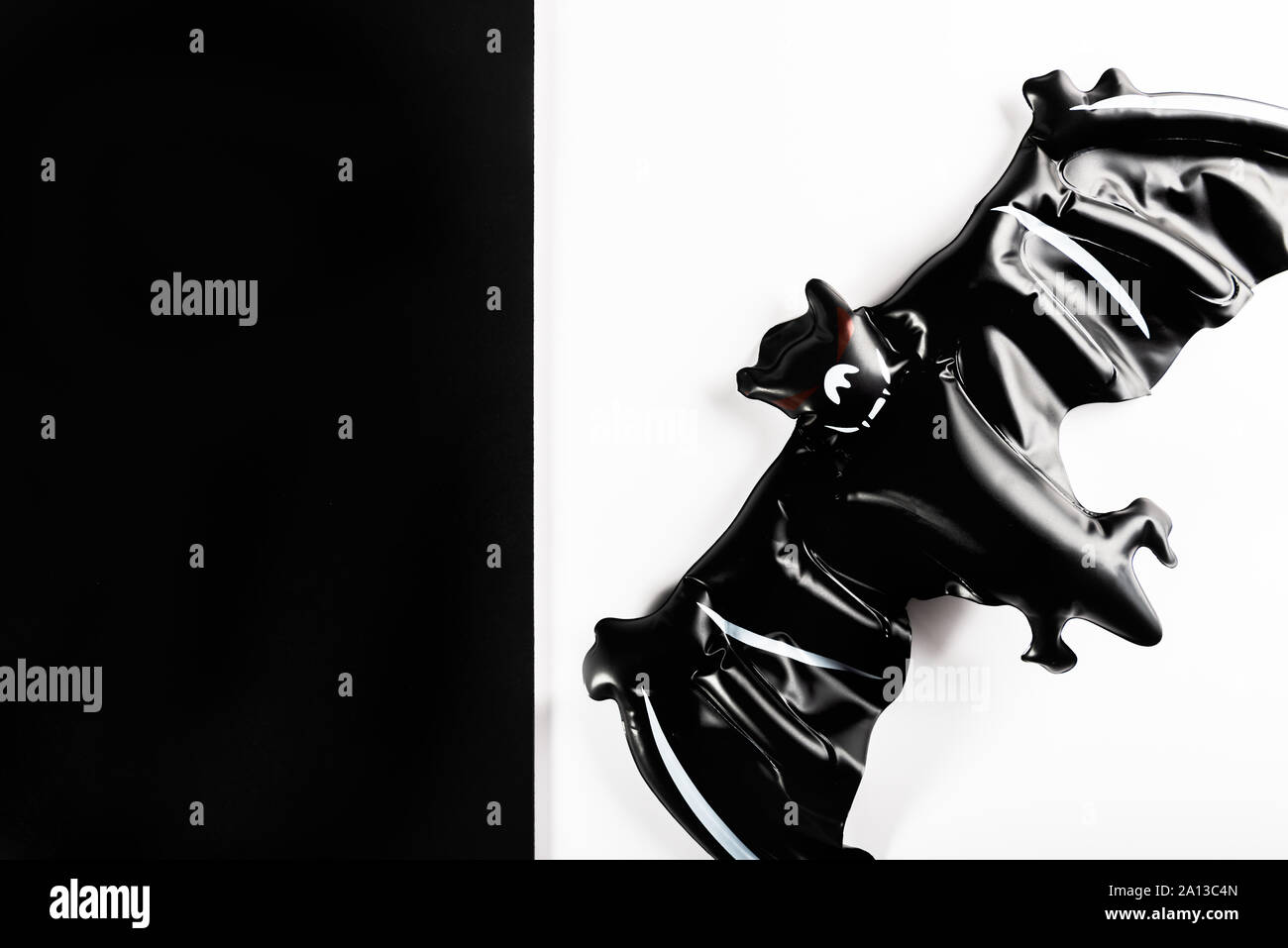 Inflatable black bat as Halloween party decoration concept, black and ...