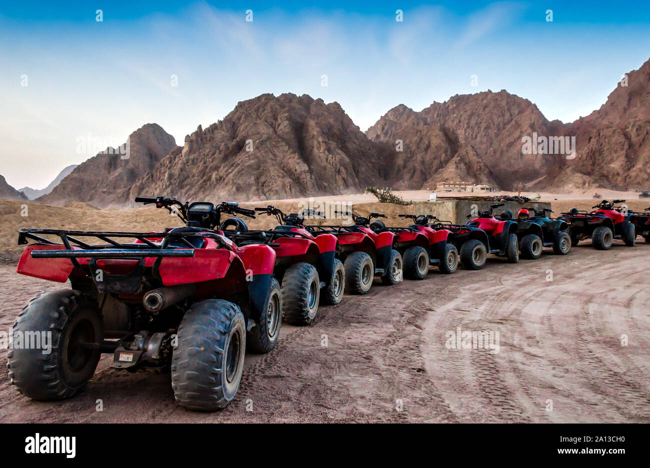 series of ATVs on the background of mountains in the desert of Sharm El ...