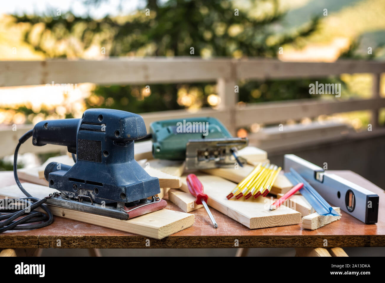Professional woodworking tools, electric sander to smooth the wood ...