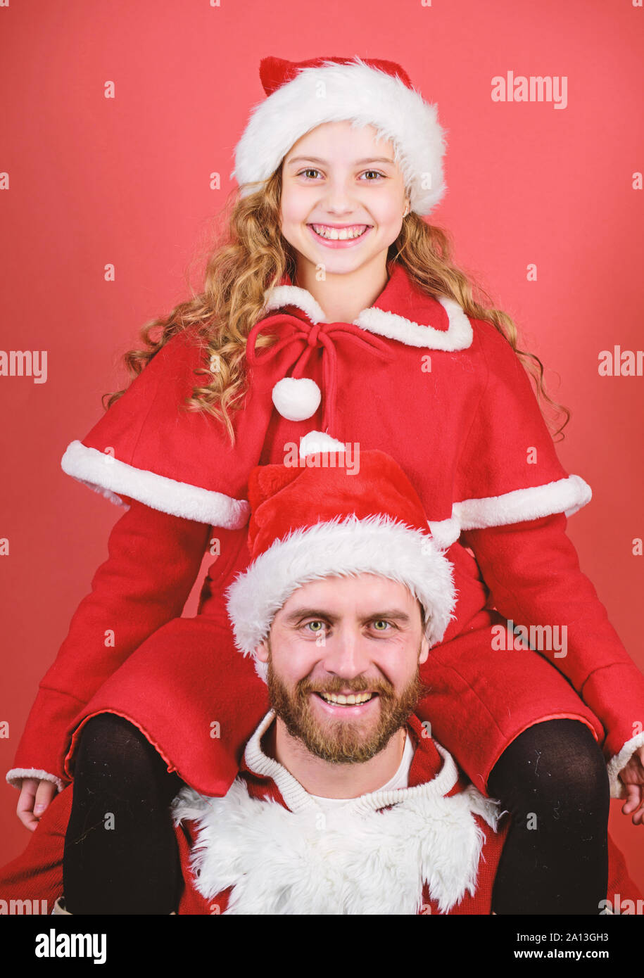 Girl little cute child and bearded father wear santa costume. How to be ...