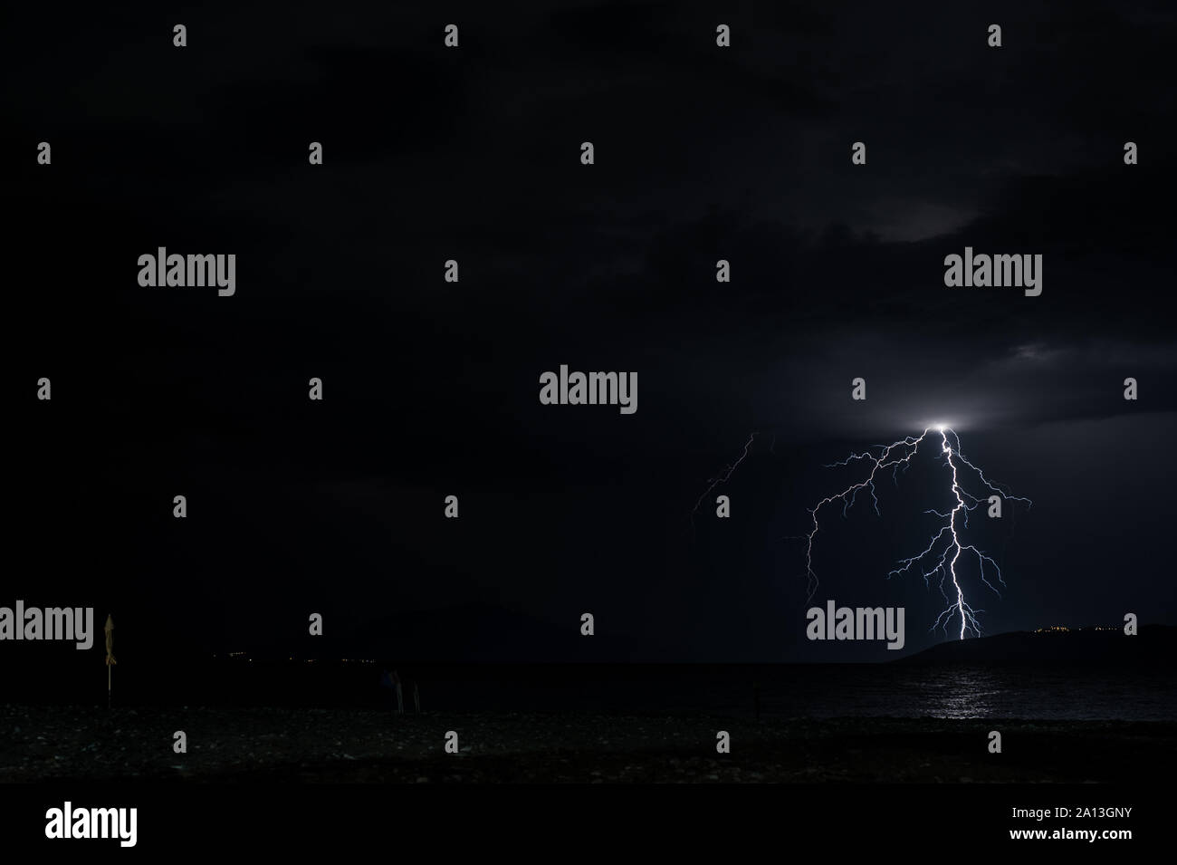 Nature's fury over Pefki, North Evia: A lightning bolt cleaves the ...