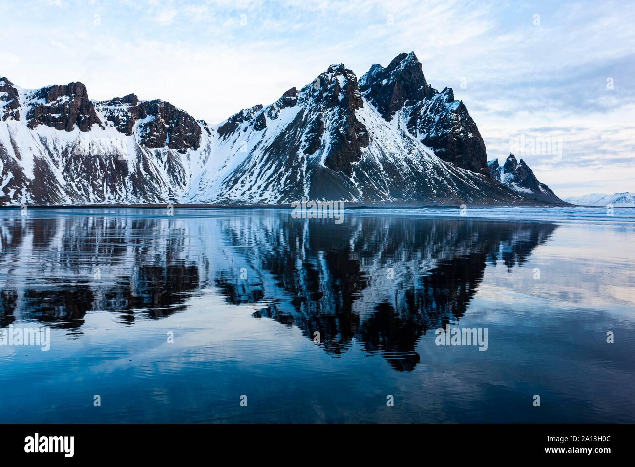 Mountain Vestrahorn With Water Reflection In The Bay Of Hornsvik