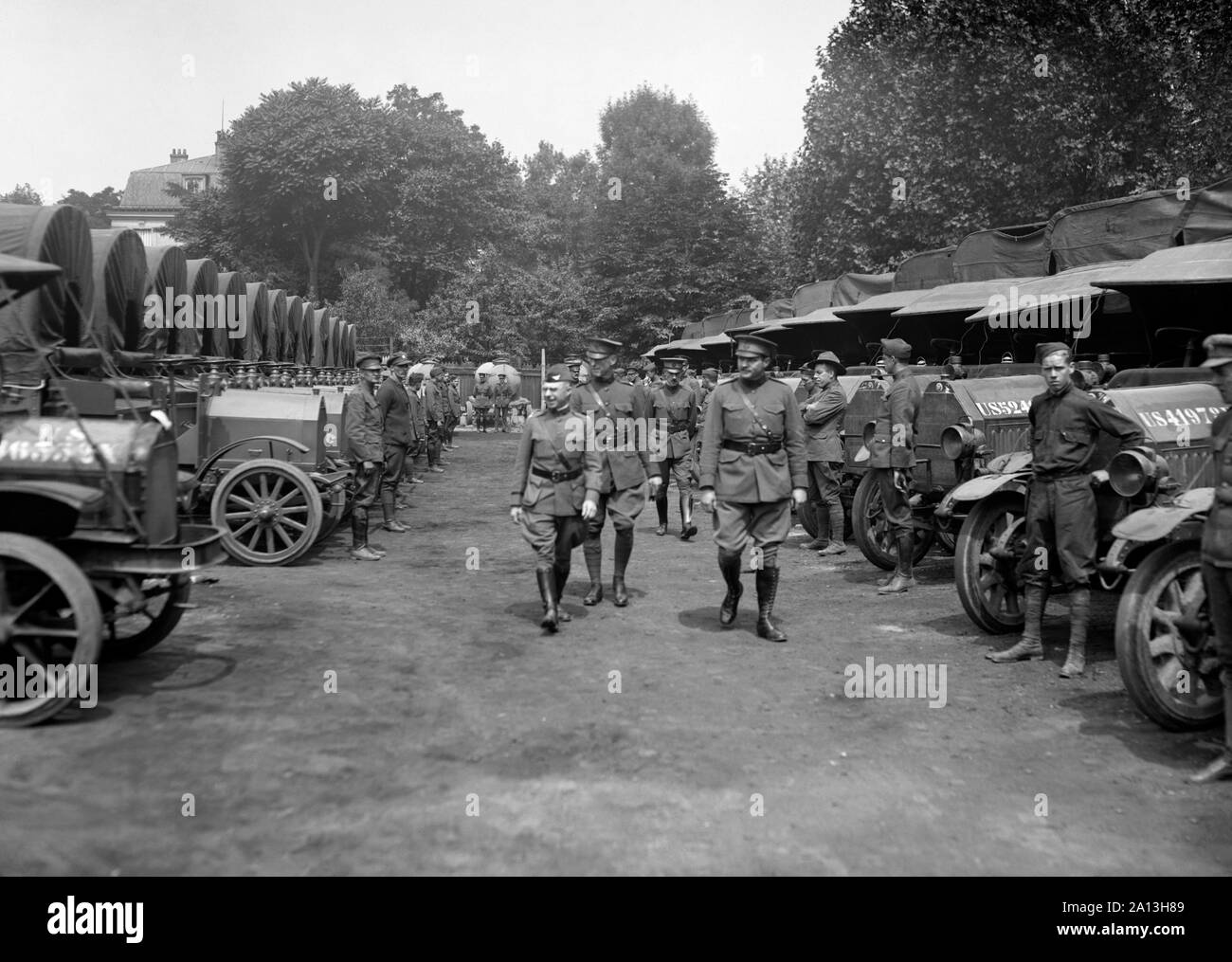 Two American Army officers inspecting a fleet of American Red Cross ...