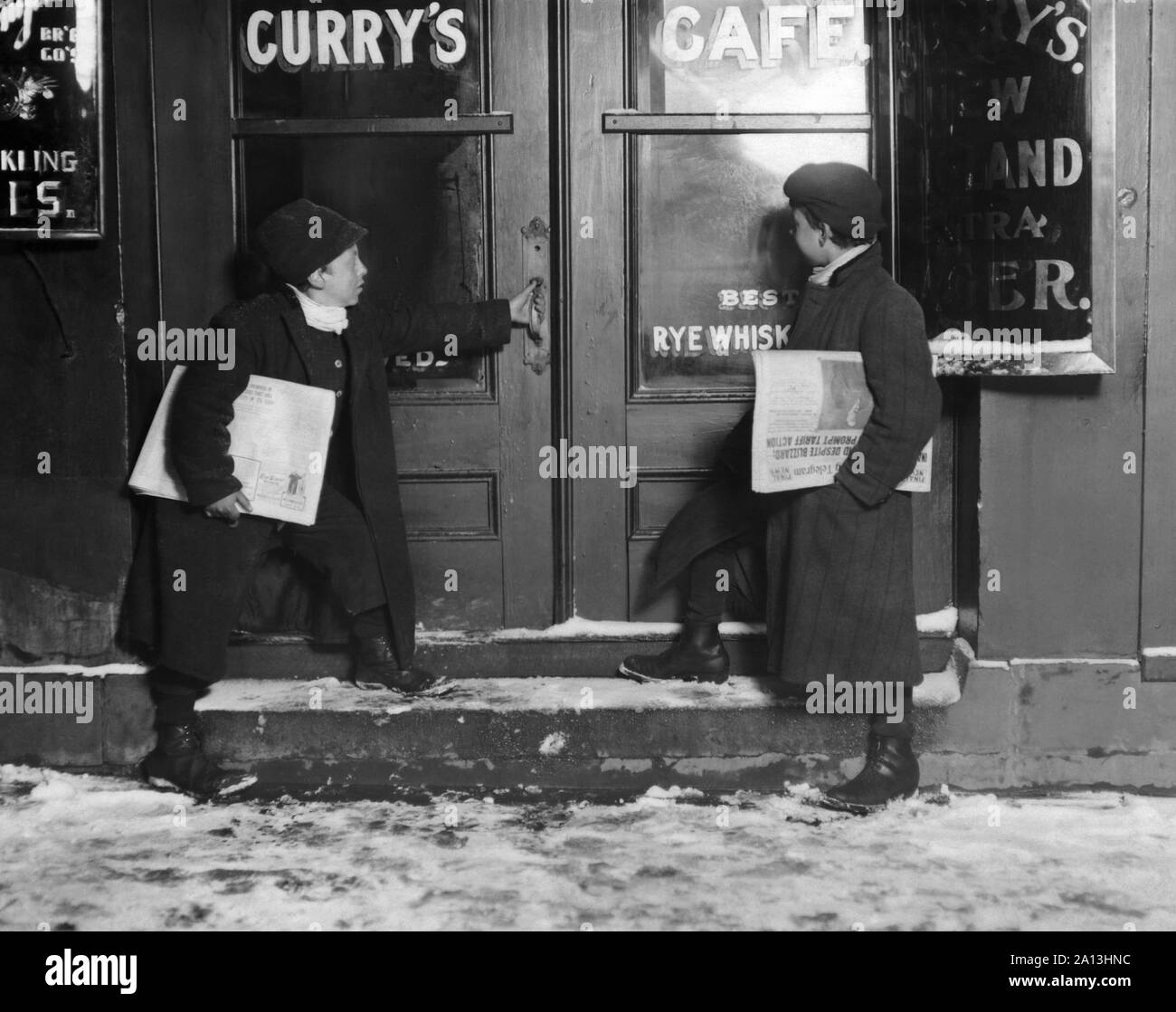 Newspaper boys (newsies) selling papers outside of a bar in Hartford ...