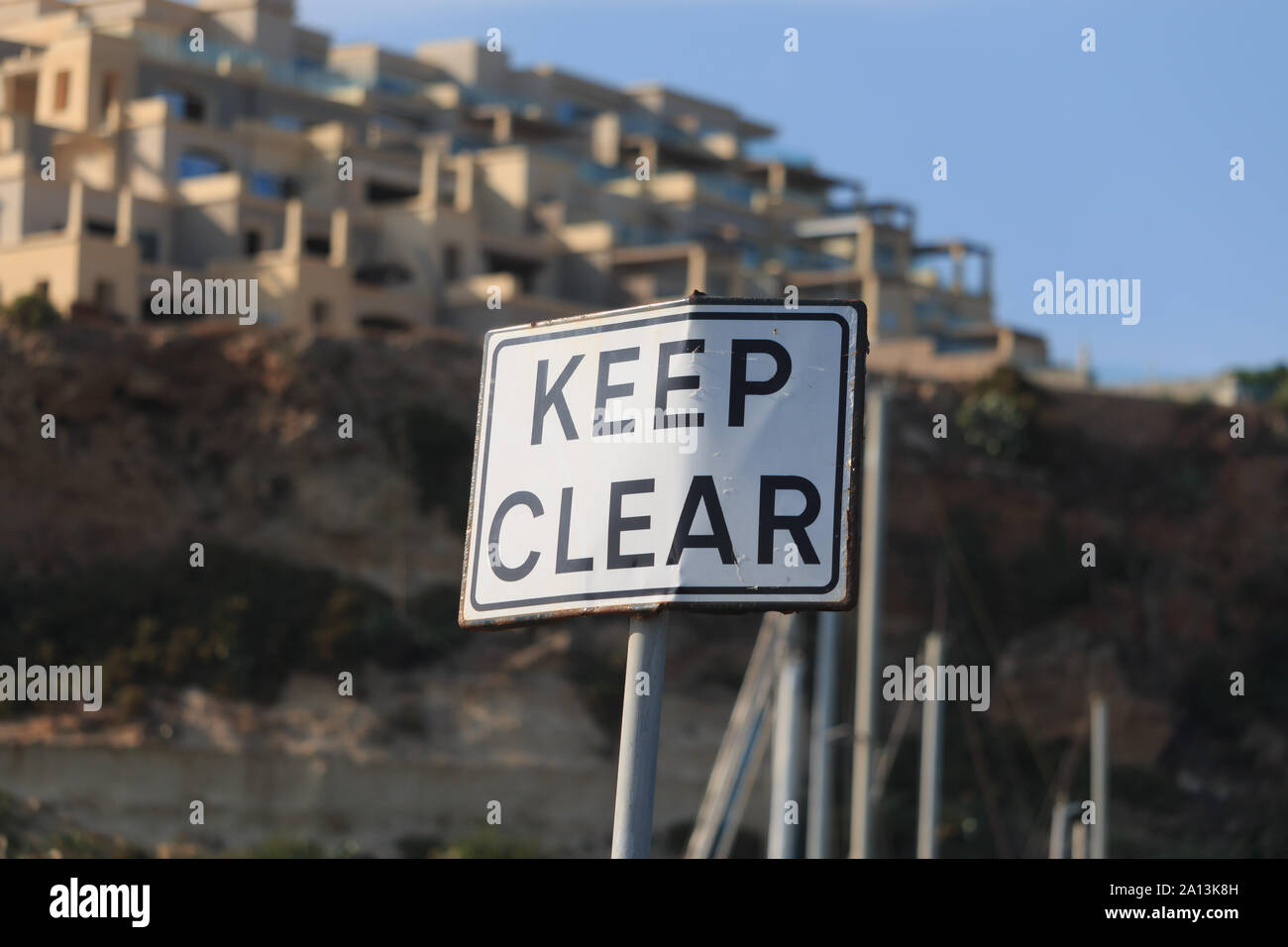 Keep clear road sign on blur background, horizontal Stock Photo - Alamy