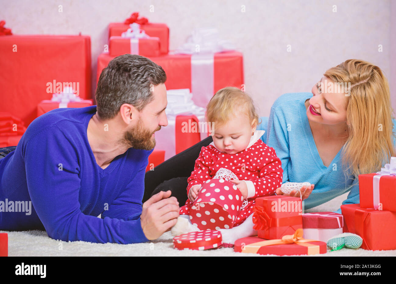 Happy family with present box. Valentines day. Red boxes. Shopping ...