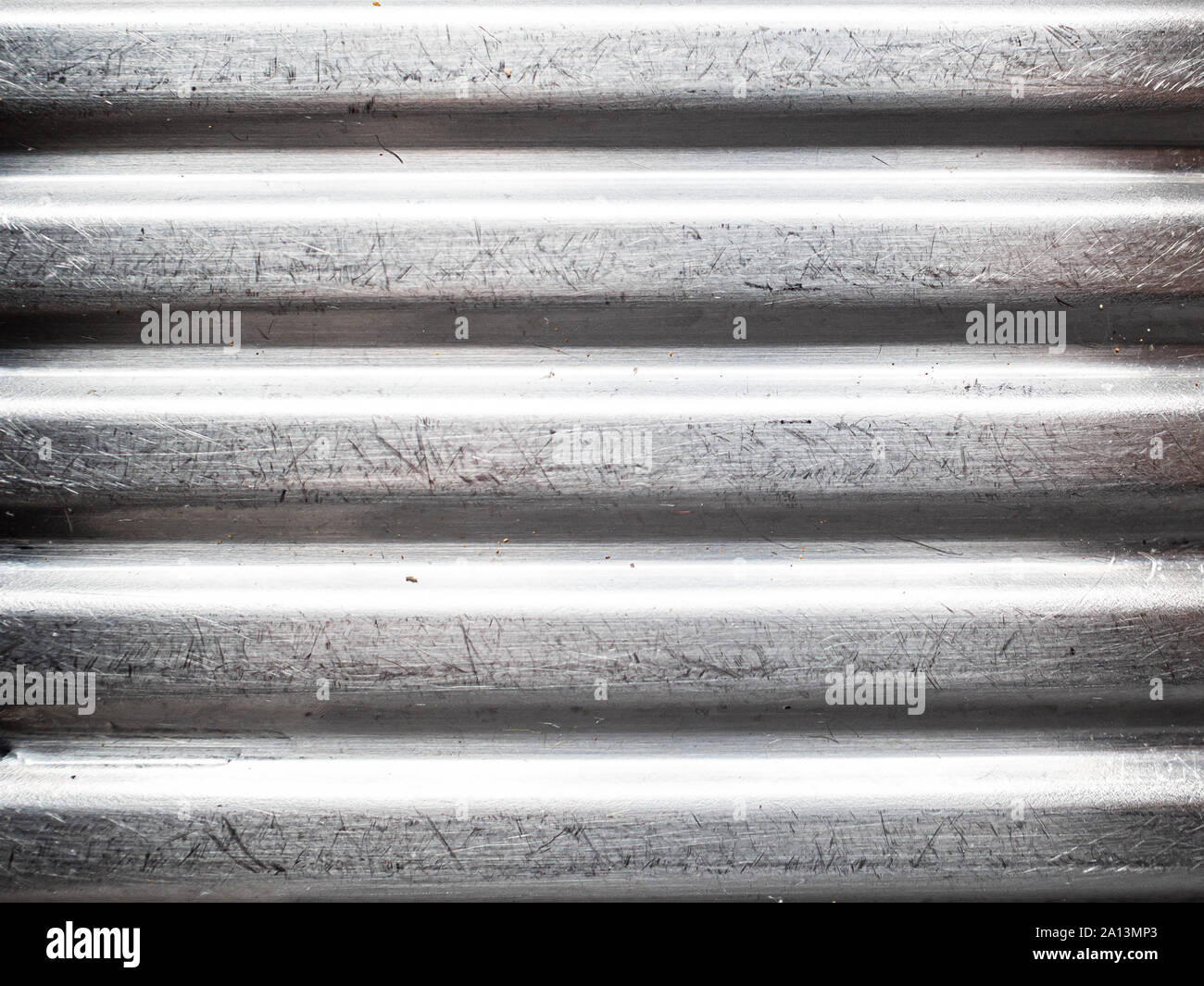 Scratched silver ridged corrugated metal panel Stock Photo - Alamy