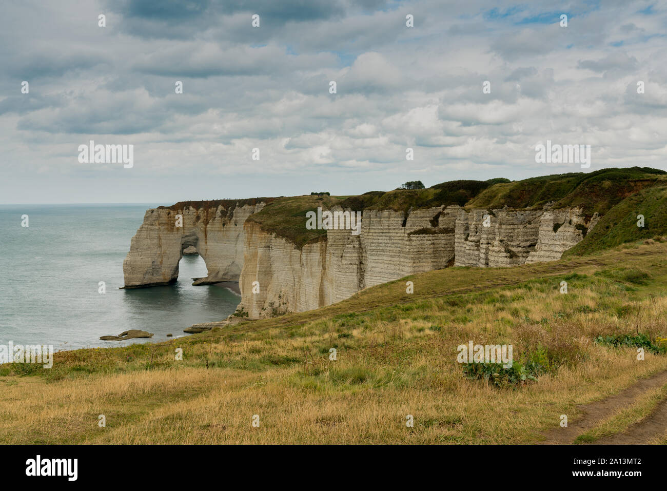 the famous cliffs and rock pinnacles of Etretat on the Normandy coast ...