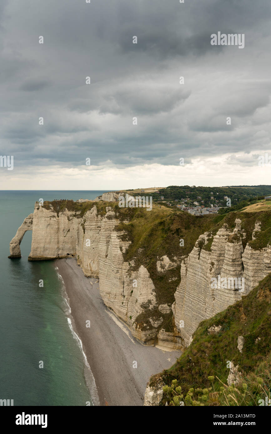 the famous cliffs and rock pinnacles of Etretat on the Normandy coast ...