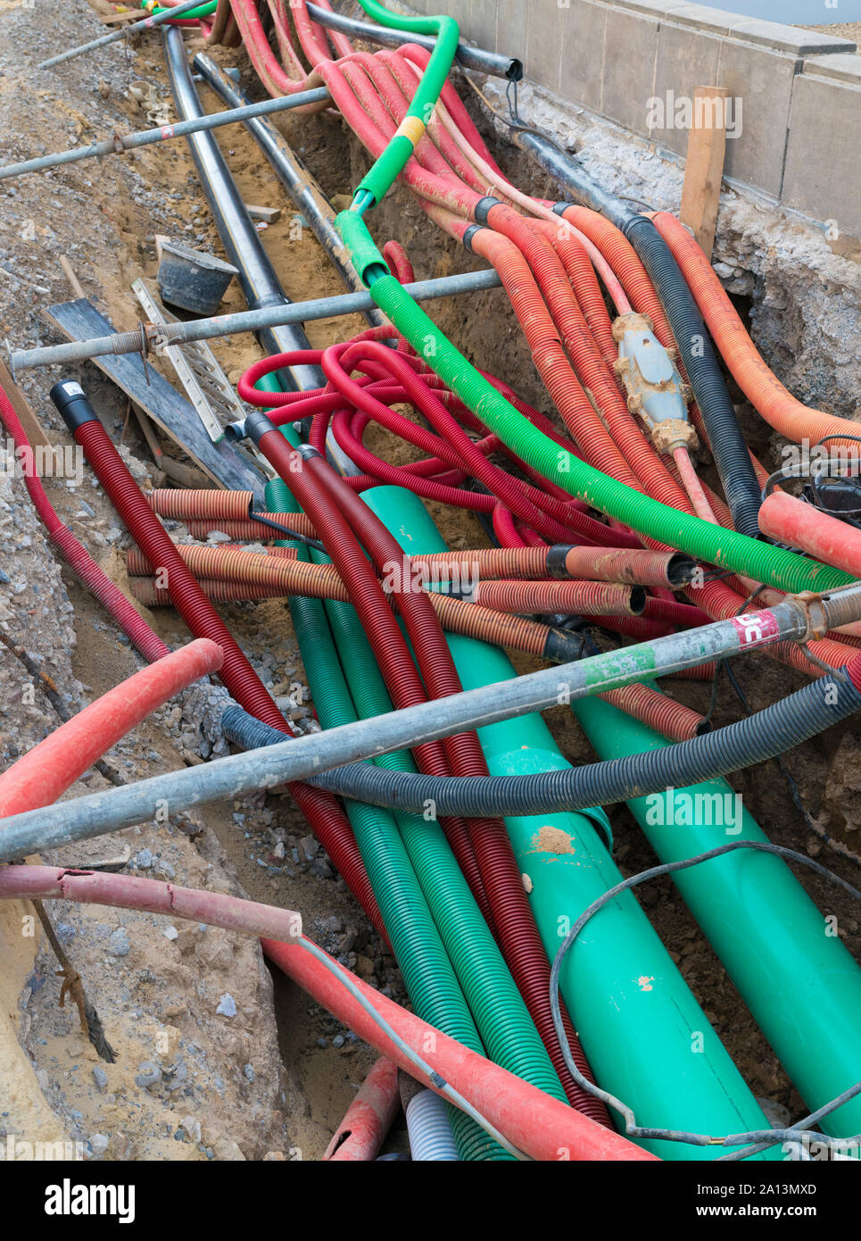vertical view of road work construction with many colorful tubes and ...