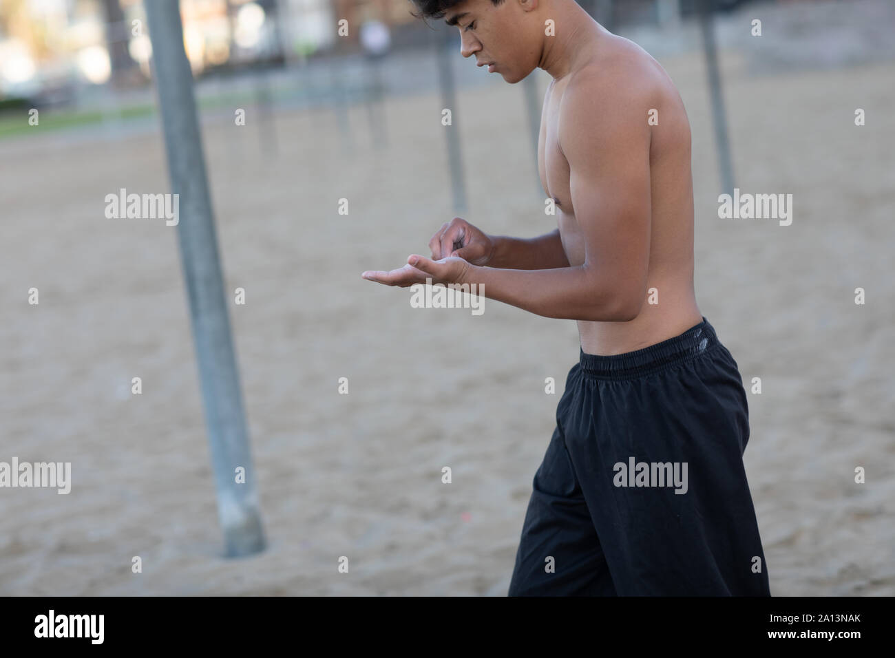 Gym Chalk hands clapping man for climbing workout on the beach, muscle ...