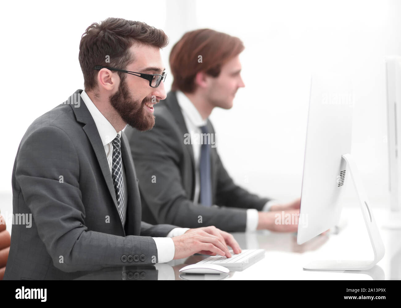 Company employees working in software development Stock Photo - Alamy