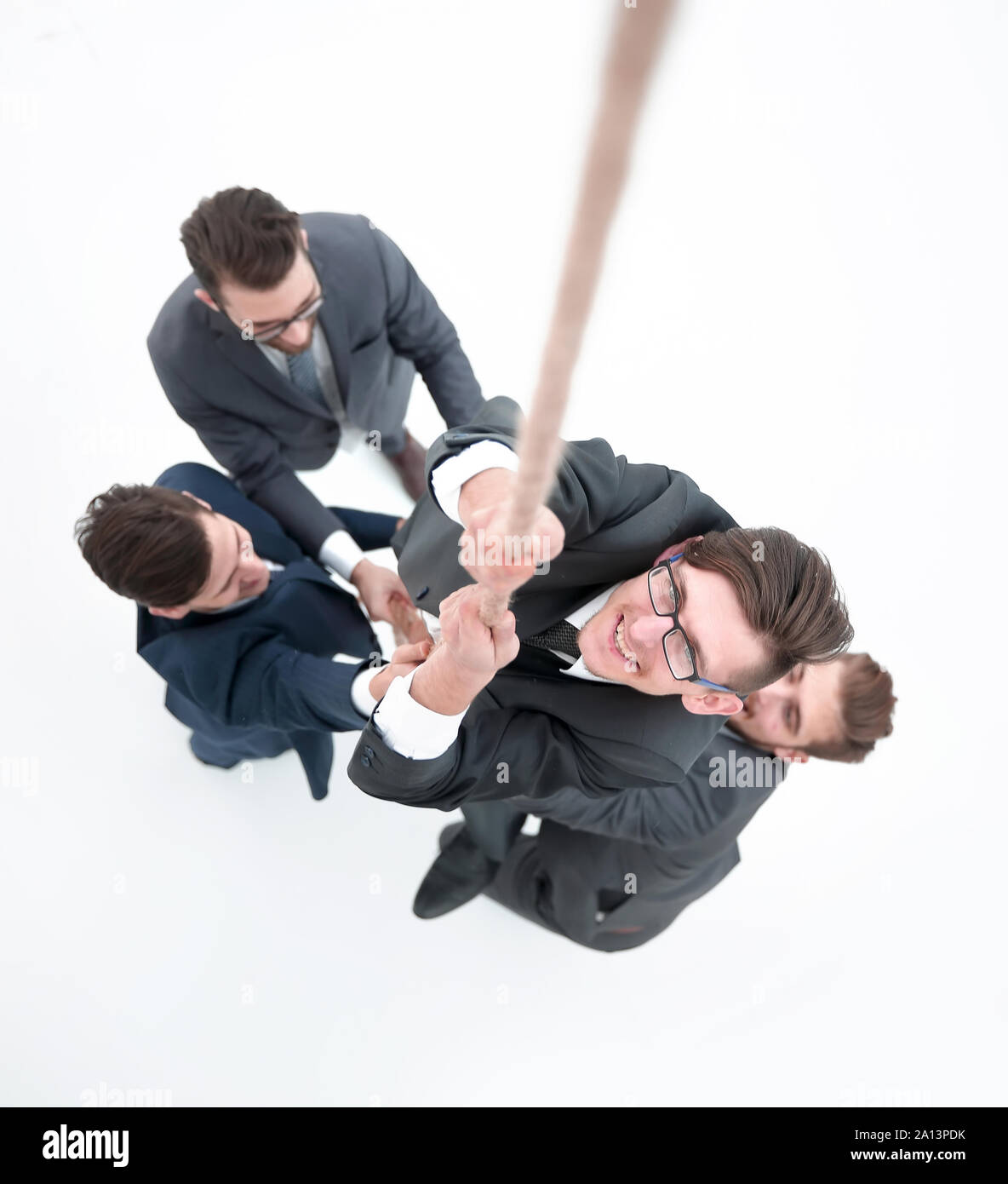 business team helping the leader to climb the rope Stock Photo - Alamy