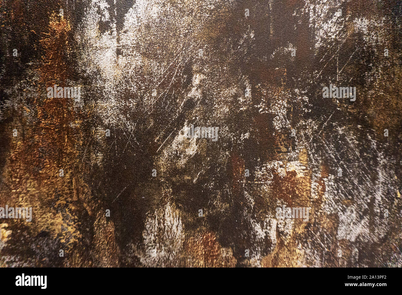 Dark black and brown background texture of a wallpaper with rusty stain ...